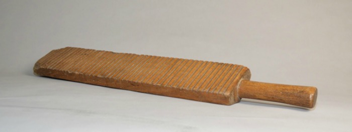 Minister gifts 700 brides wooden bats; to be used on husbands if they ...